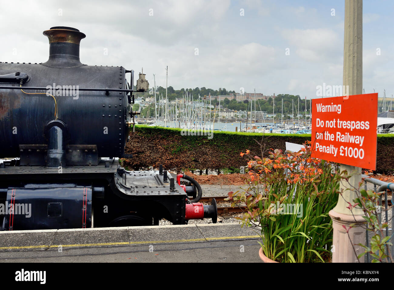 Steam train leaving Kingswear station on the Dartmouth Steam Railway ...
