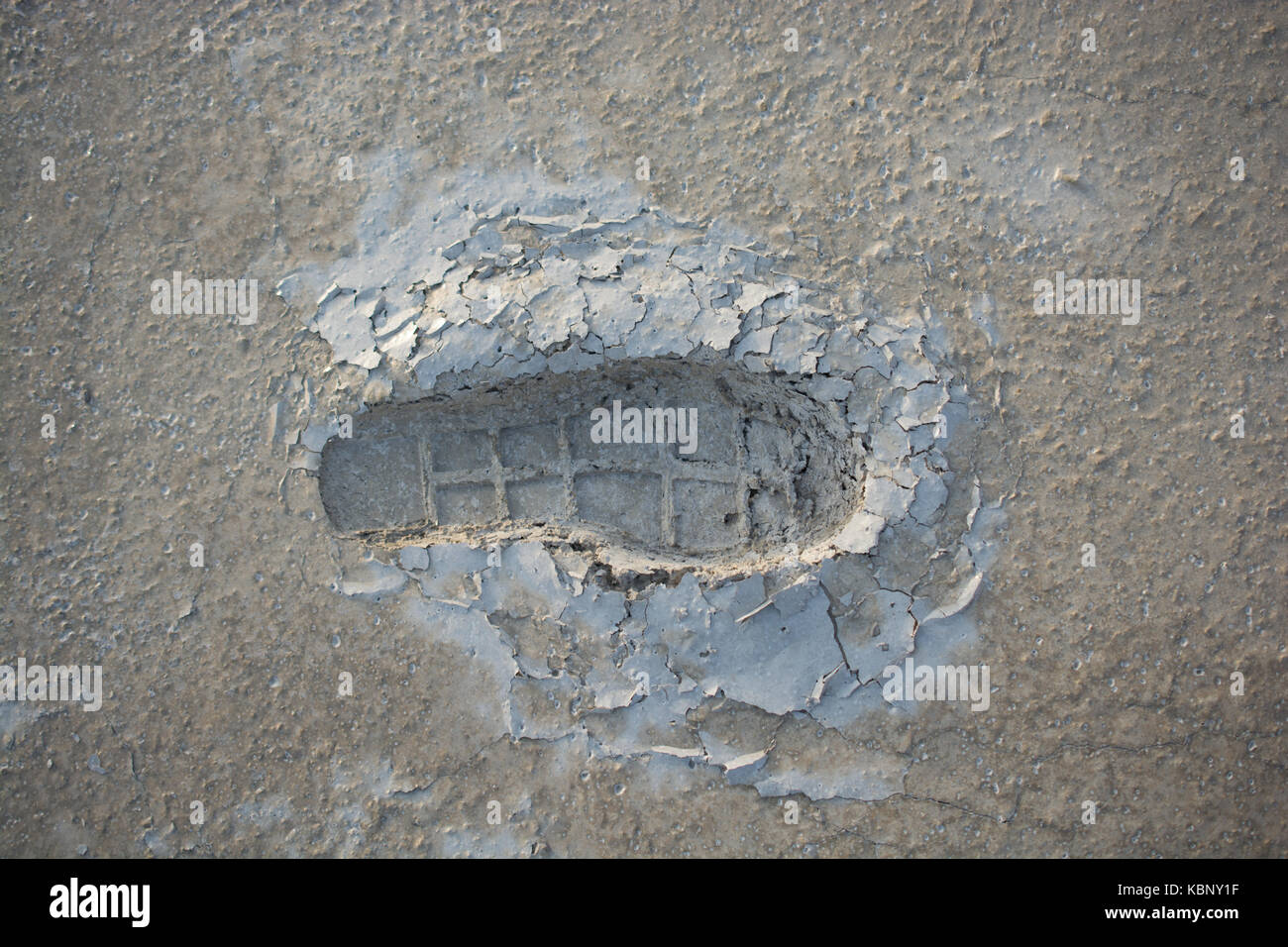 Footstep pattern seen on a concrete background Stock Photo - Alamy