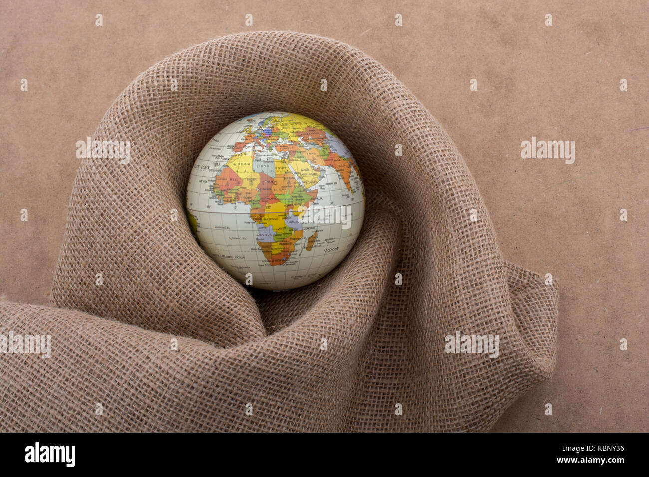 Linen canvas is wrapped around a model globe Stock Photo - Alamy