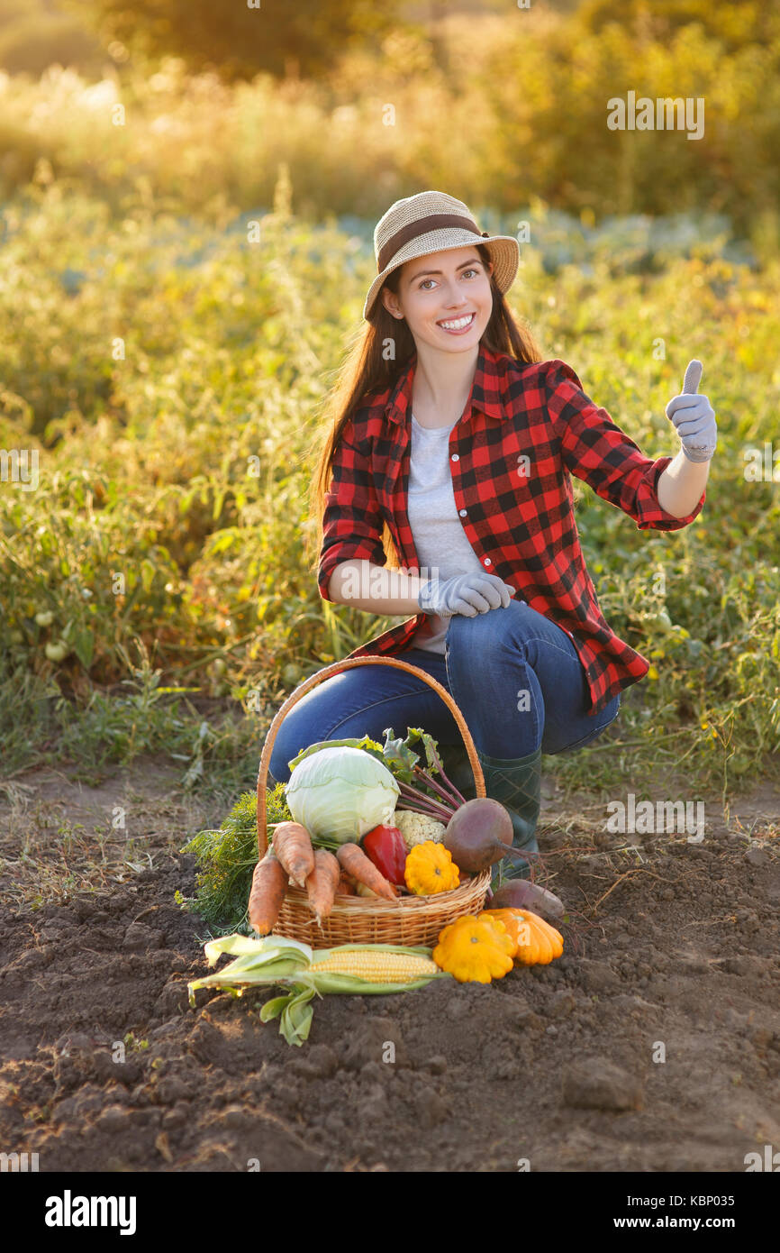 woman with basket of vegetables Stock Photo - Alamy