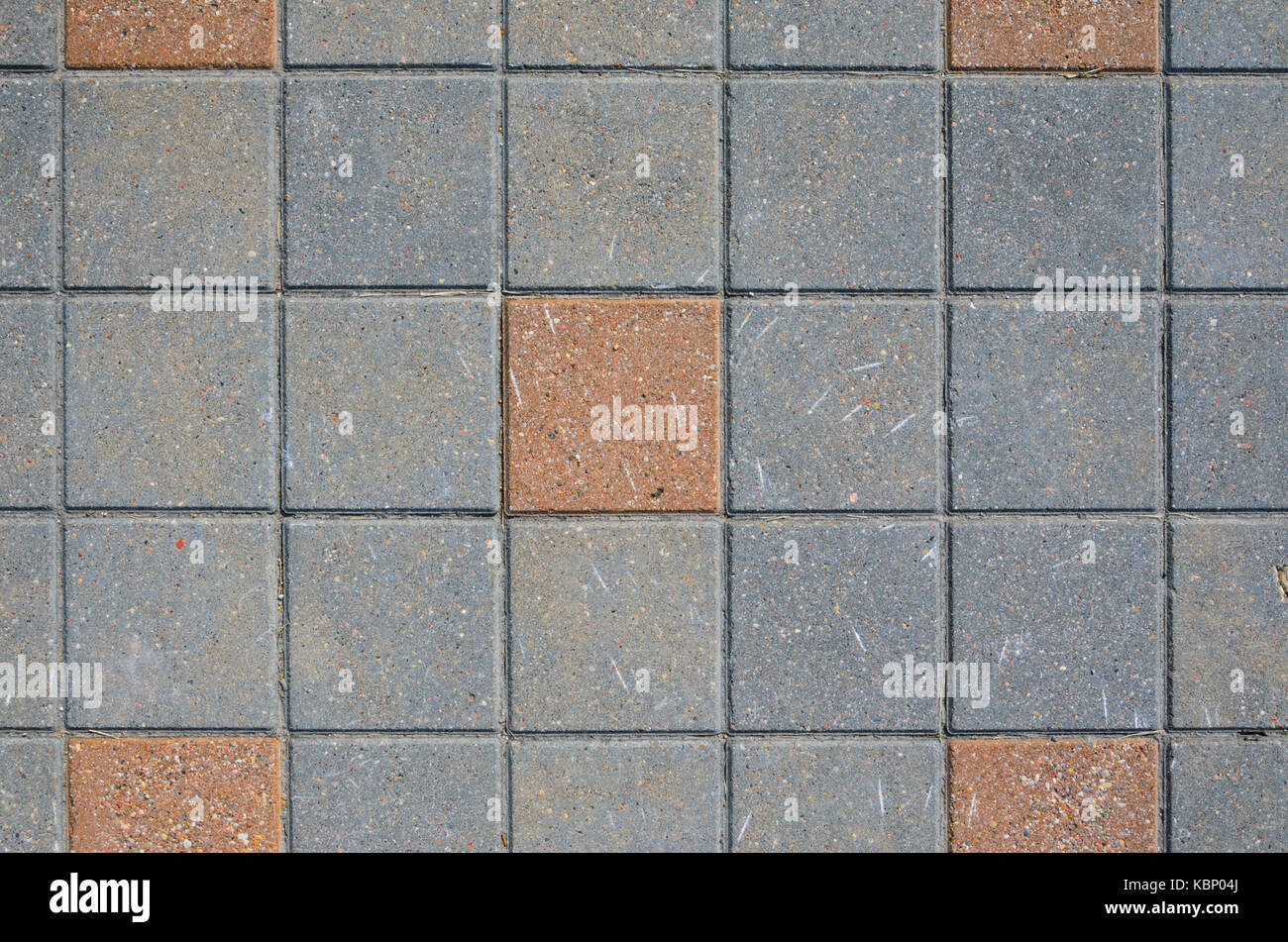 Gray Concrete Square Paving Stone Texture with Inserts from a Red Stone ...