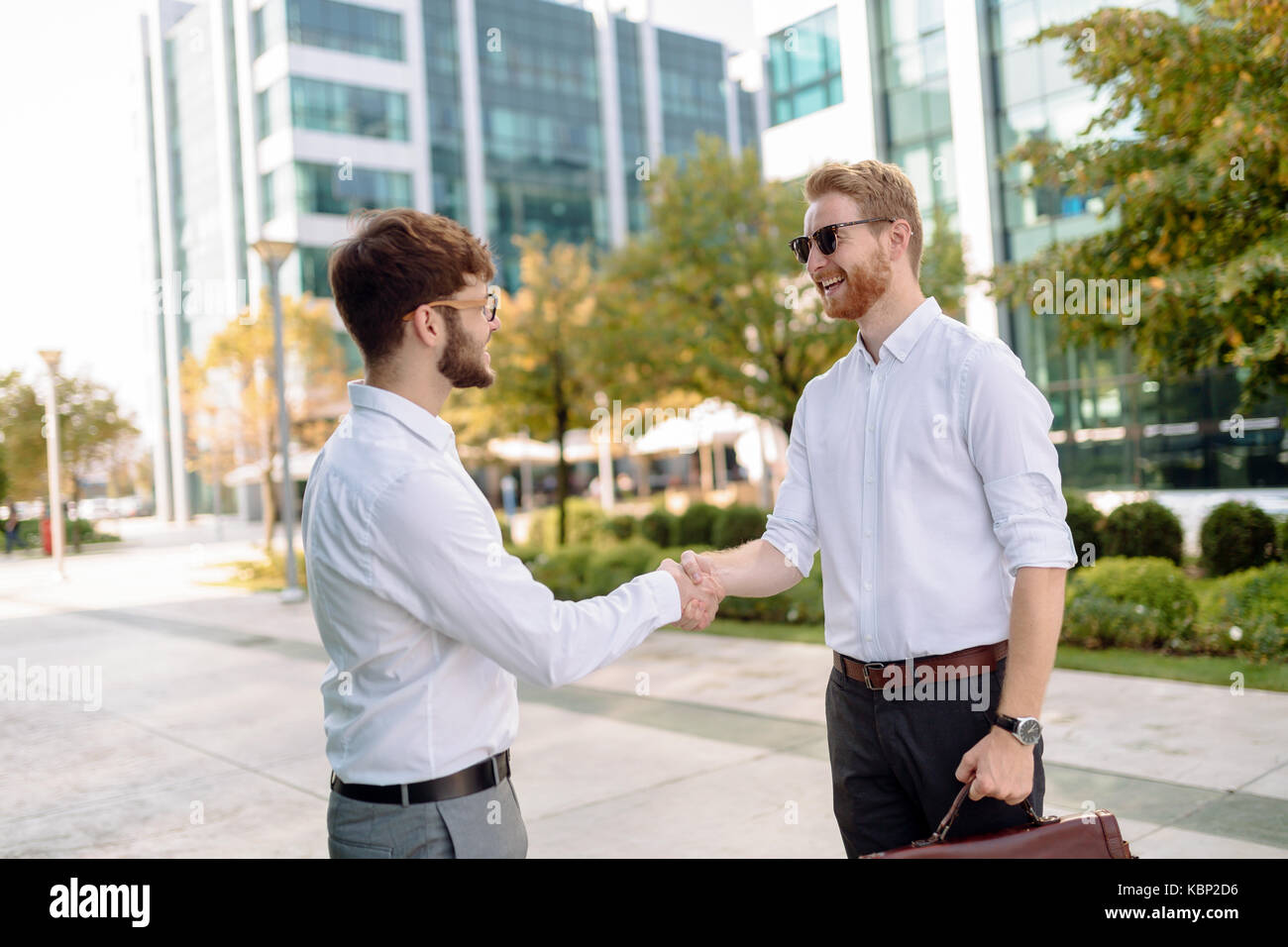 Business people shaking hands Stock Photo - Alamy