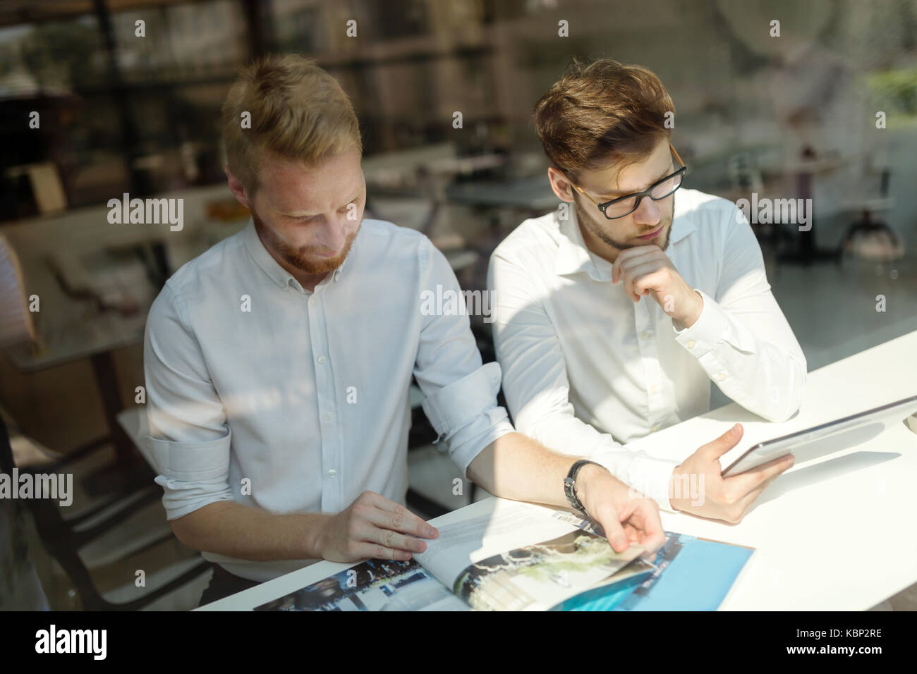 Busy business people working on break Stock Photo - Alamy
