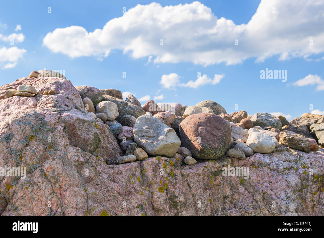 Stone landscape on a background of blue sky with clouds Stock Photo - Alamy