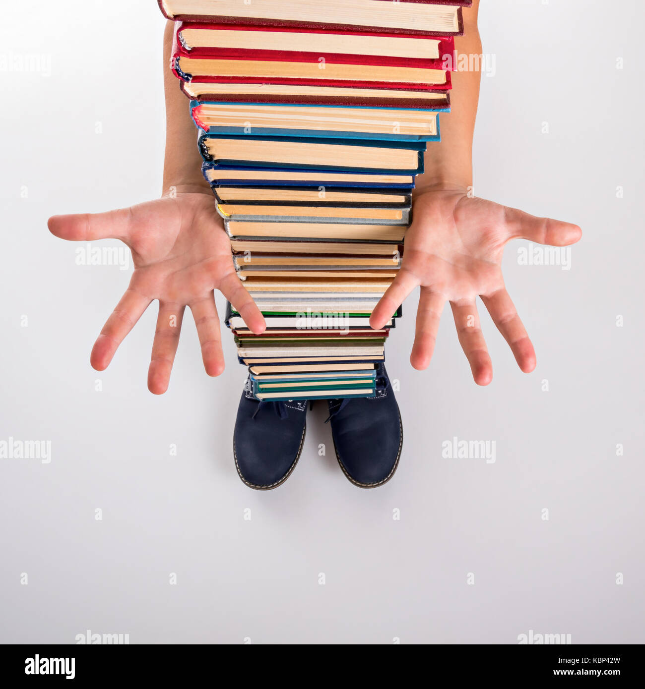 Unusual funny education concept with book boy Stock Photo - Alamy