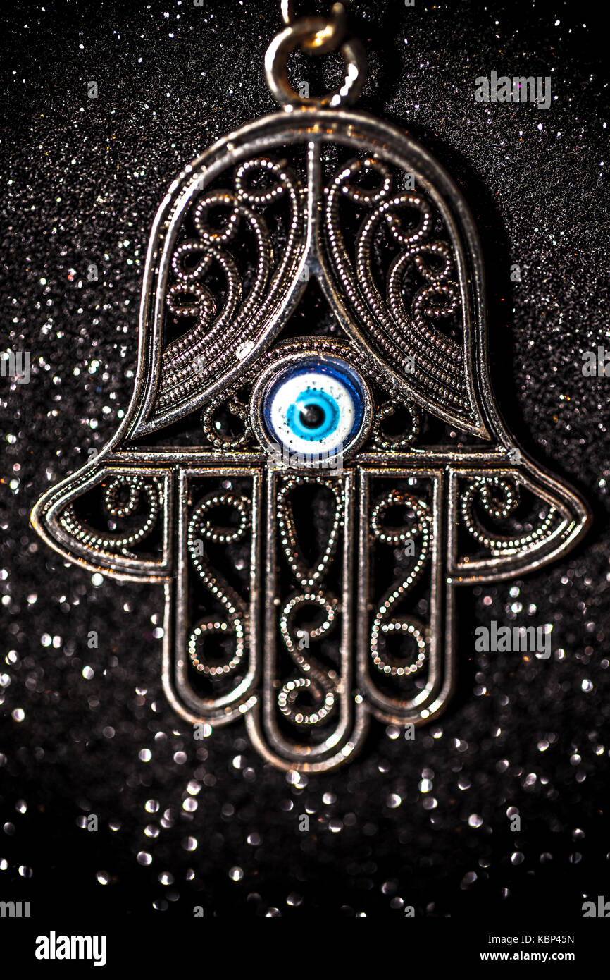hanging tibetan hamsa made from metal Stock Photo - Alamy