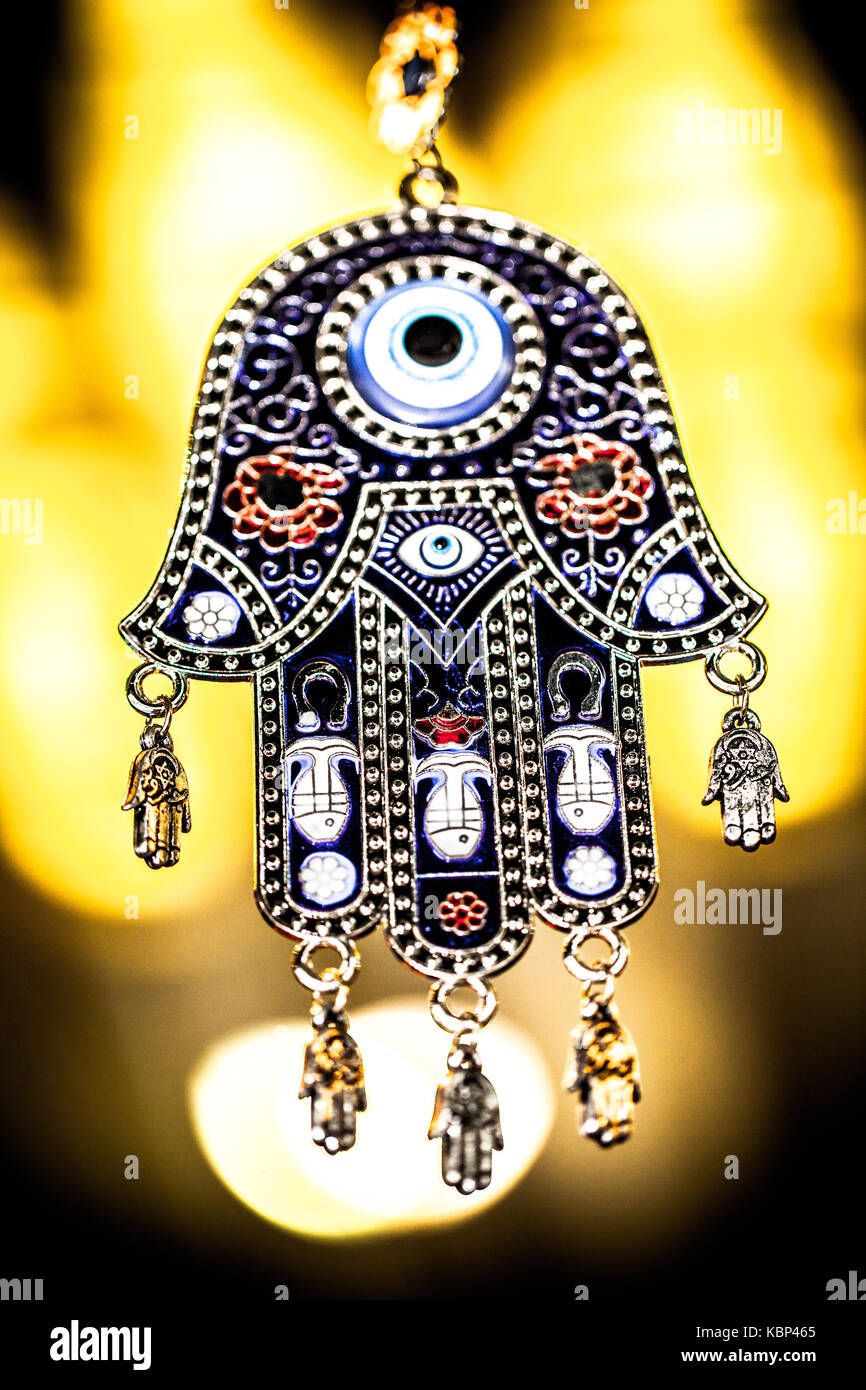 hanging tibetan hamsa made from metal Stock Photo - Alamy