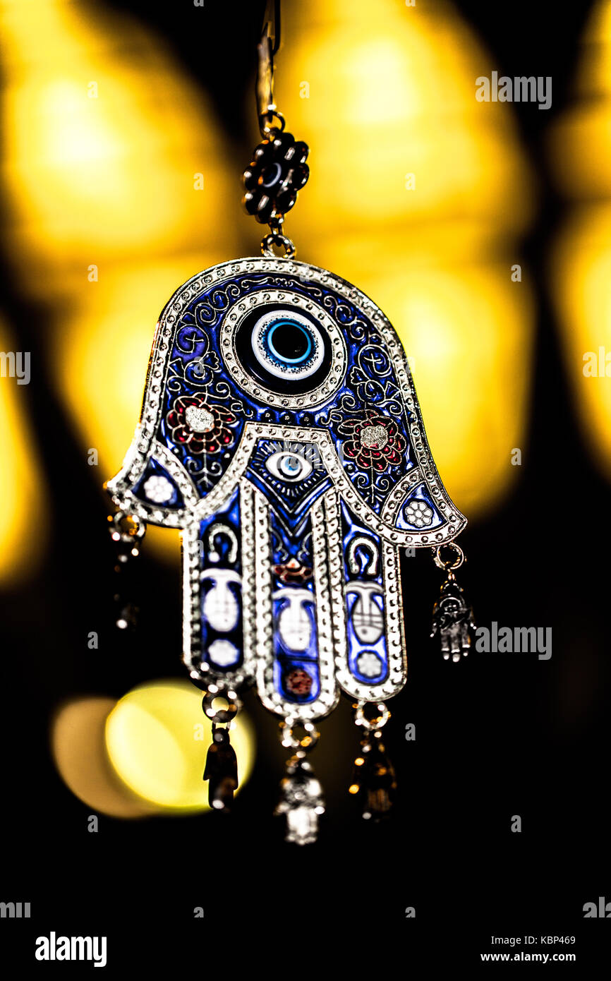 hanging tibetan hamsa made from metal Stock Photo - Alamy