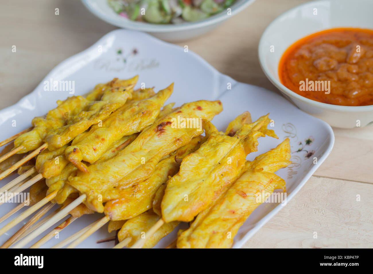 Grilled chicken satay with peanut sauce and vinegar of vegetable mix ...