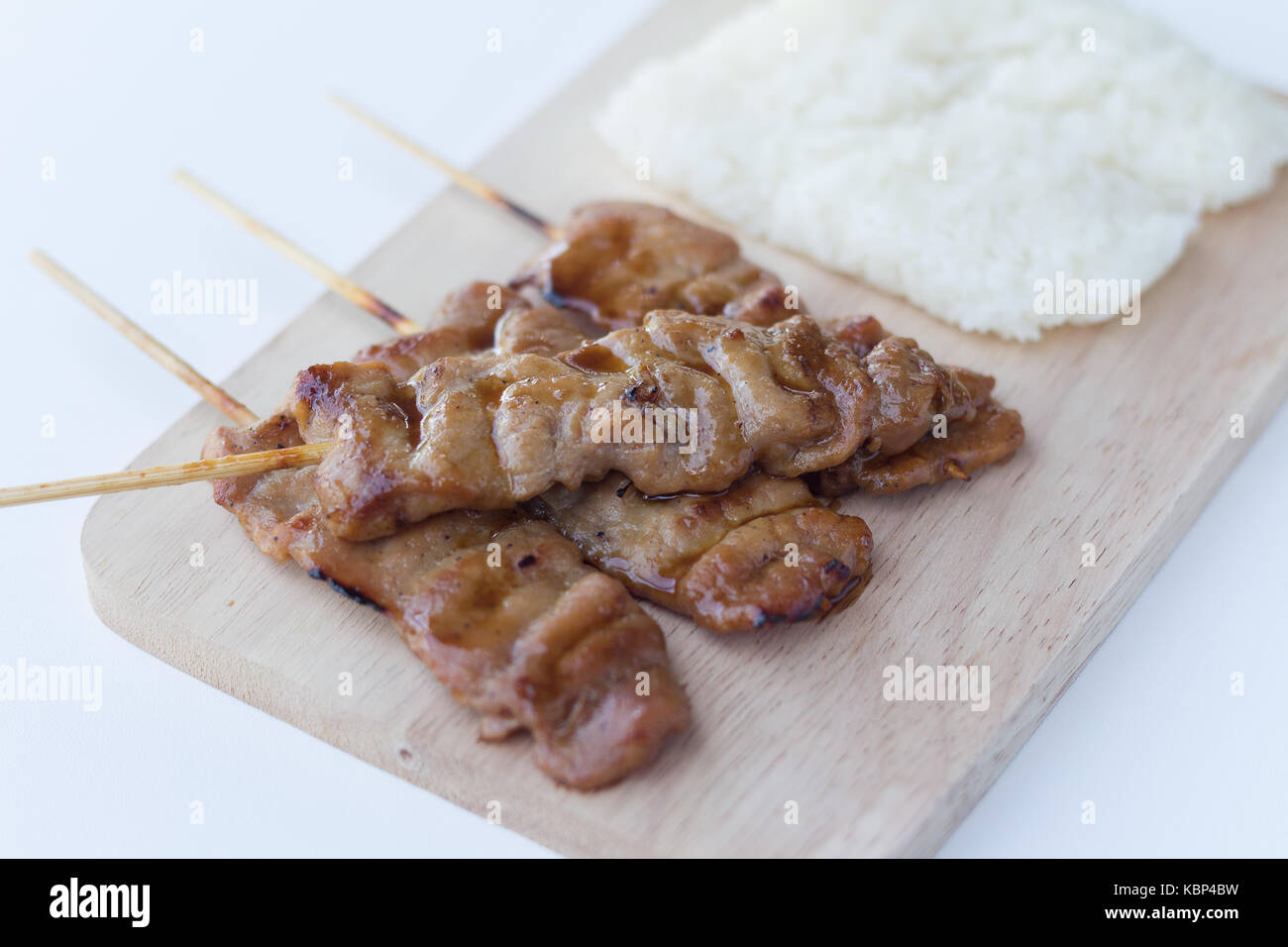 Grilled pork in asian style sticky rice that in Thailand is famous food ...