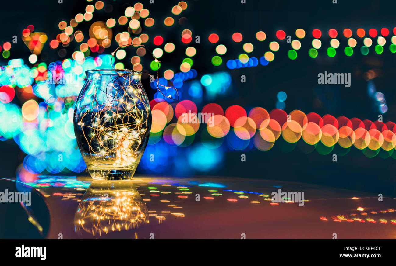 Beautiful abstract of bokeh effect of festive lights through a glass ...