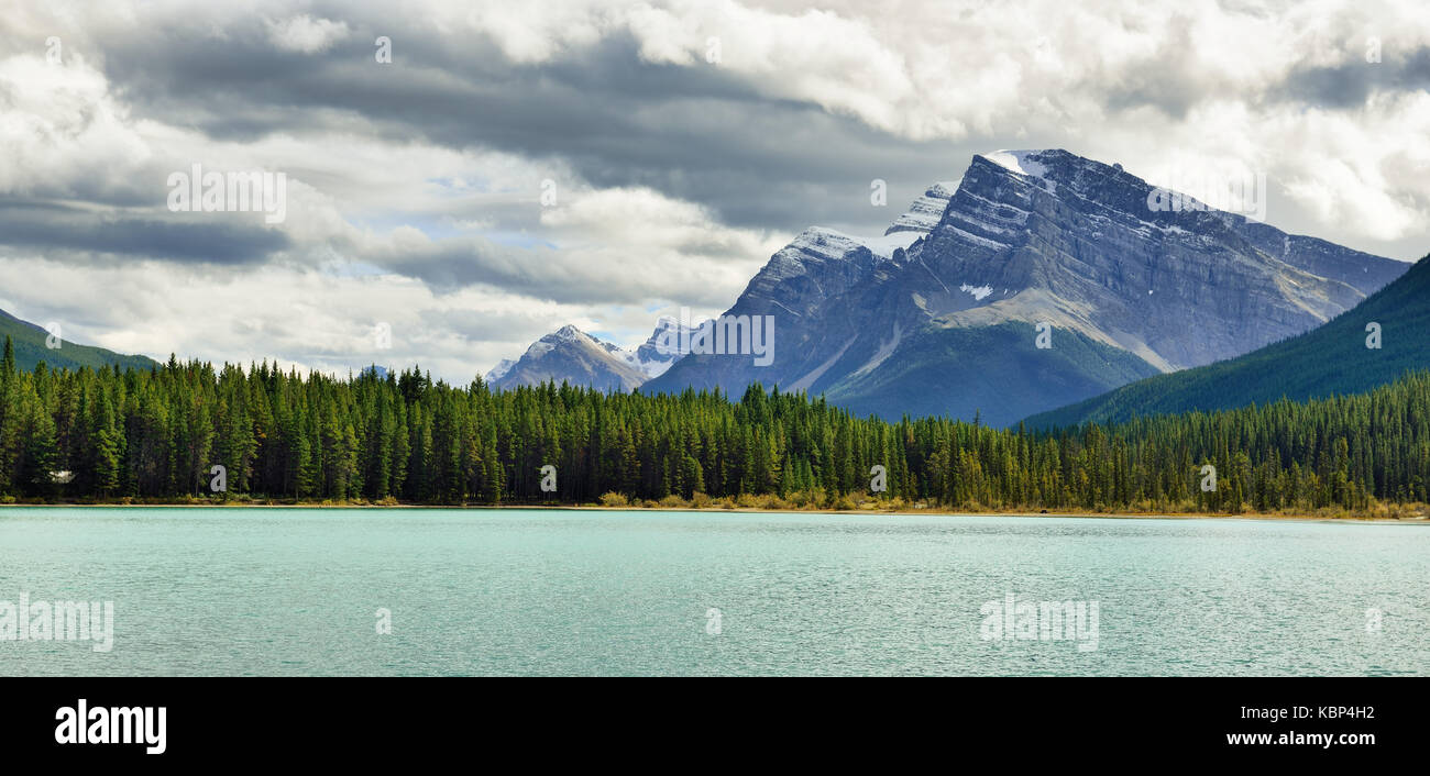 Beautiful high mountains of the Canadian Rockies and an alpine river ...
