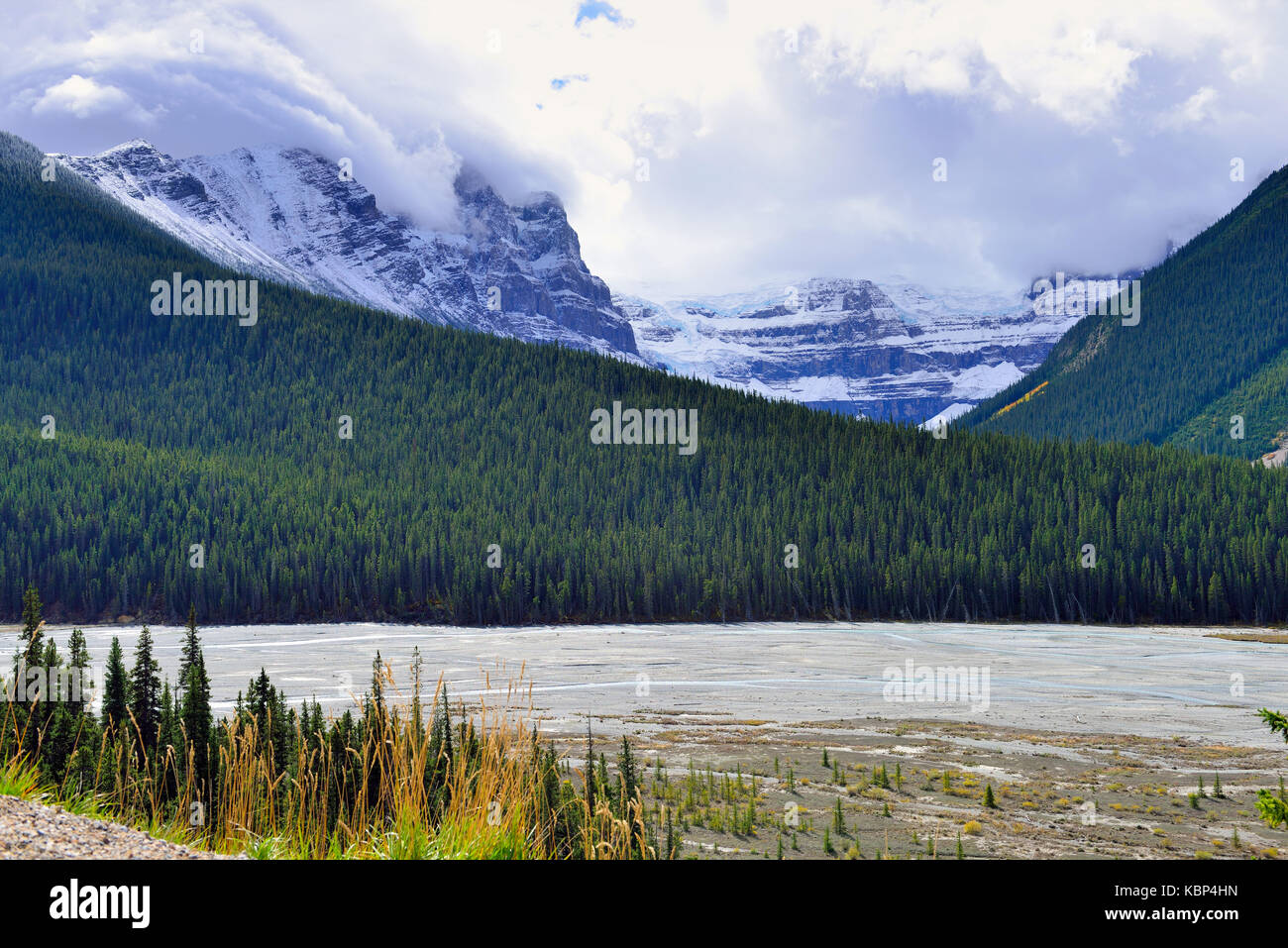 Beautiful high mountains of the Canadian Rockies and an alpine river ...