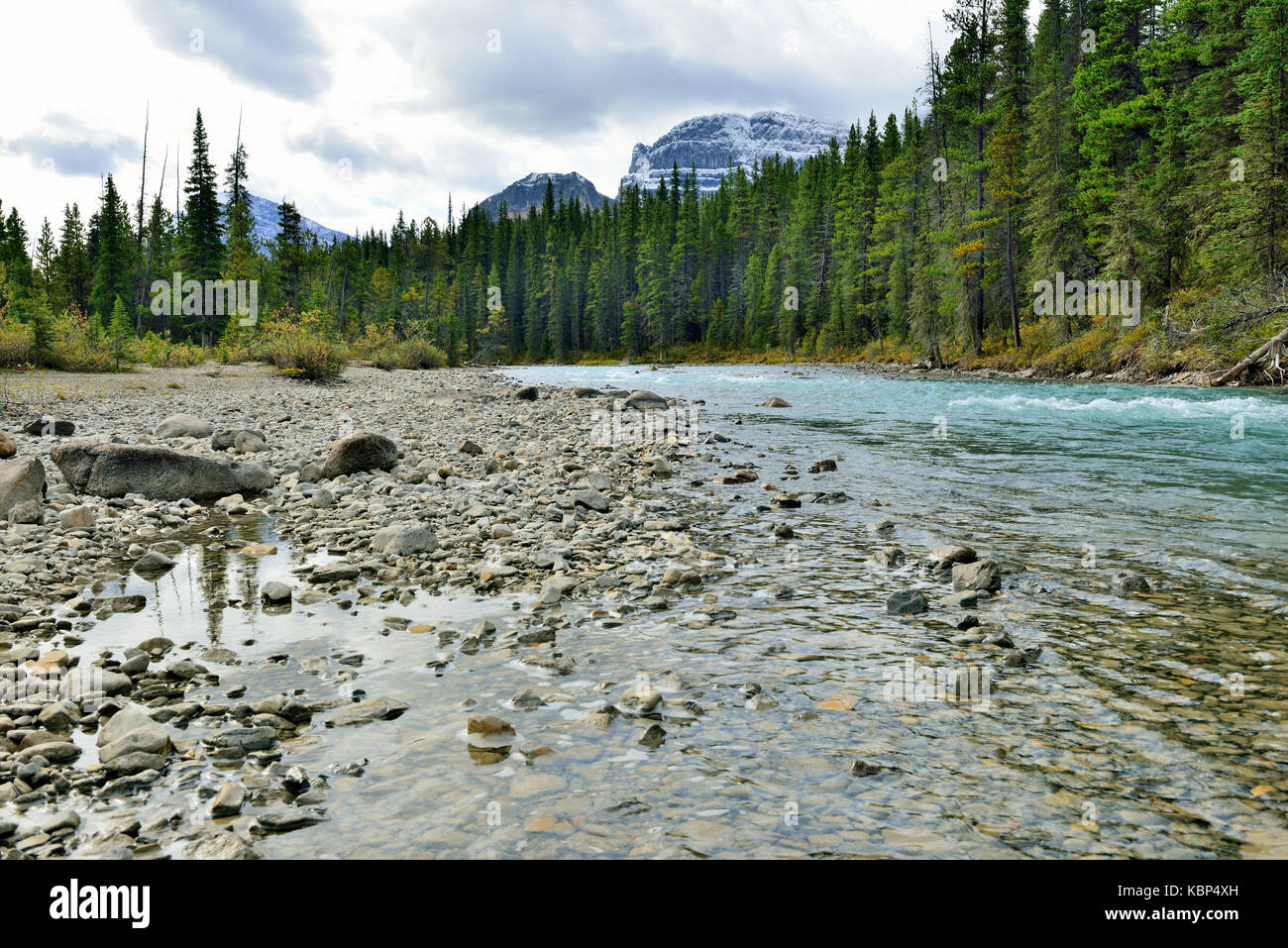Beautiful high mountains of the Canadian Rockies and an alpine river ...