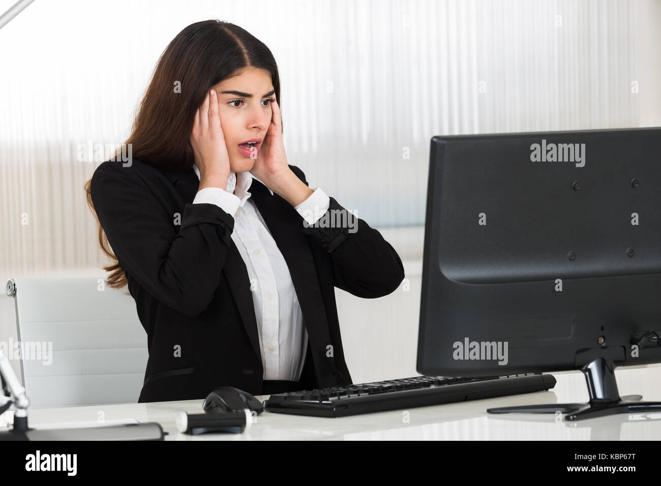 Person looking at monitor hi-res stock photography and images - Alamy