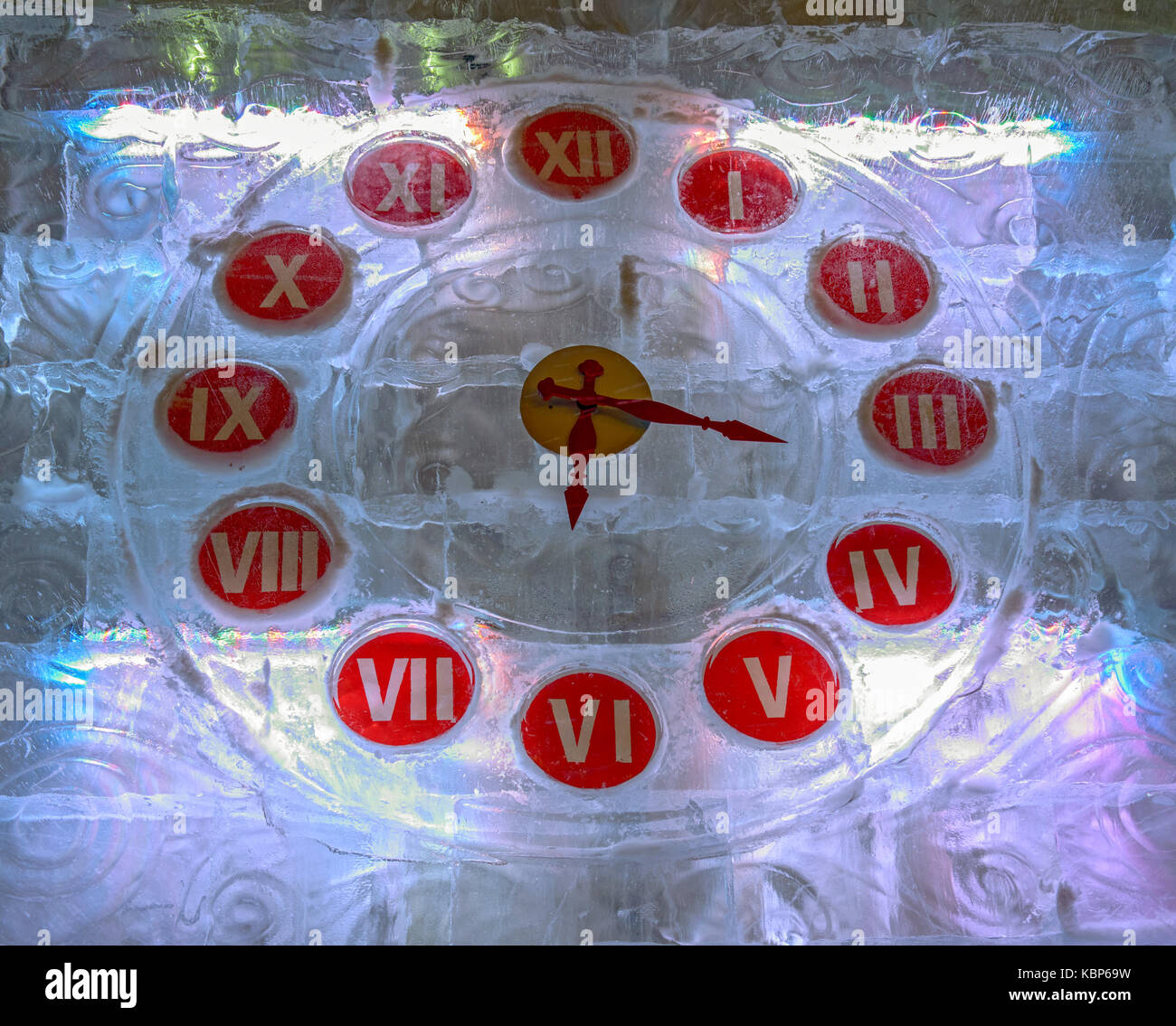 Clock dial on ice wall Stock Photo - Alamy
