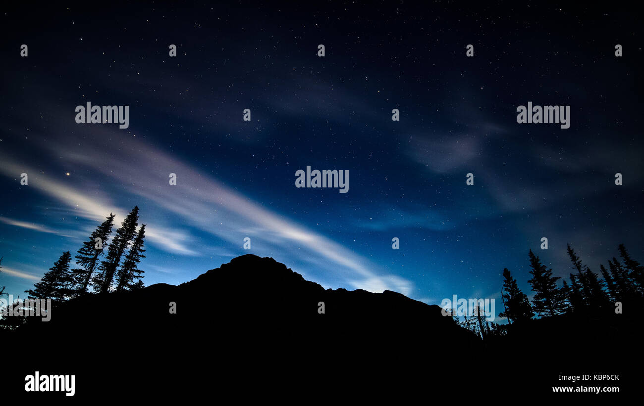 Dramatic deep blue night sky over mountain Stock Photo - Alamy