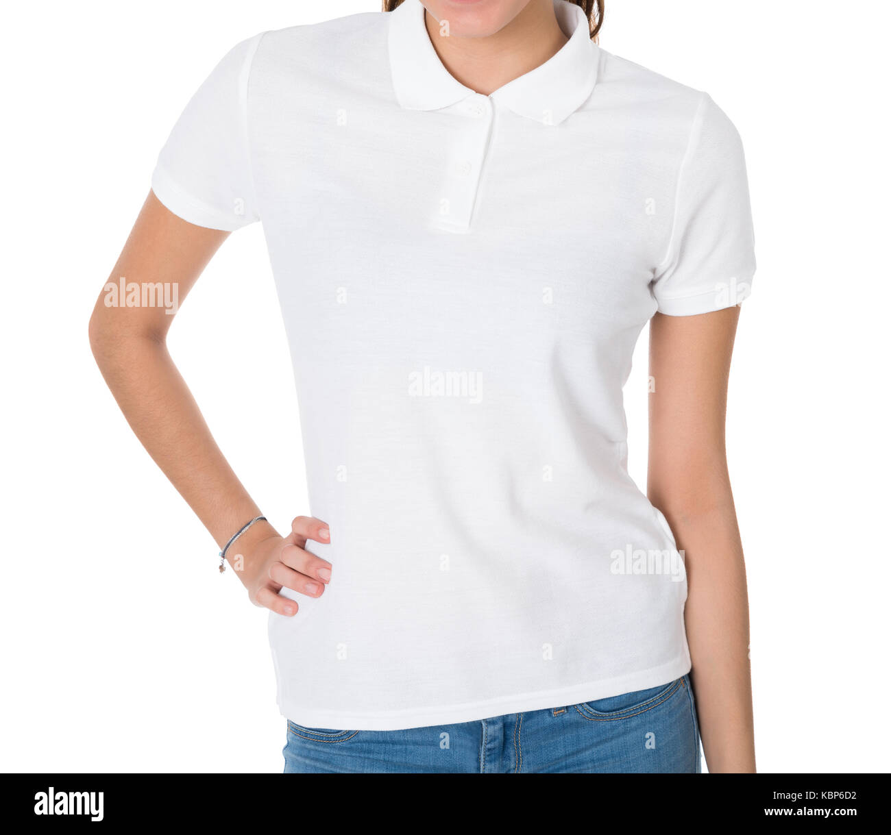 Midsection of young woman wearing blank tshirt on white background ...