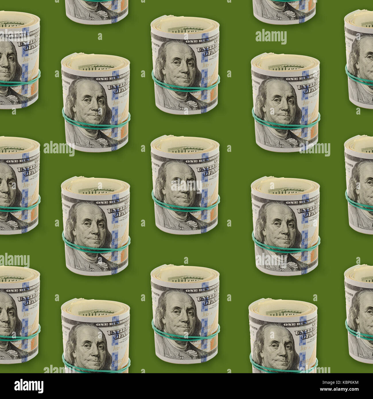 Seamless pattern with plenty rolls of One Hundred Dollar Bills on a ...