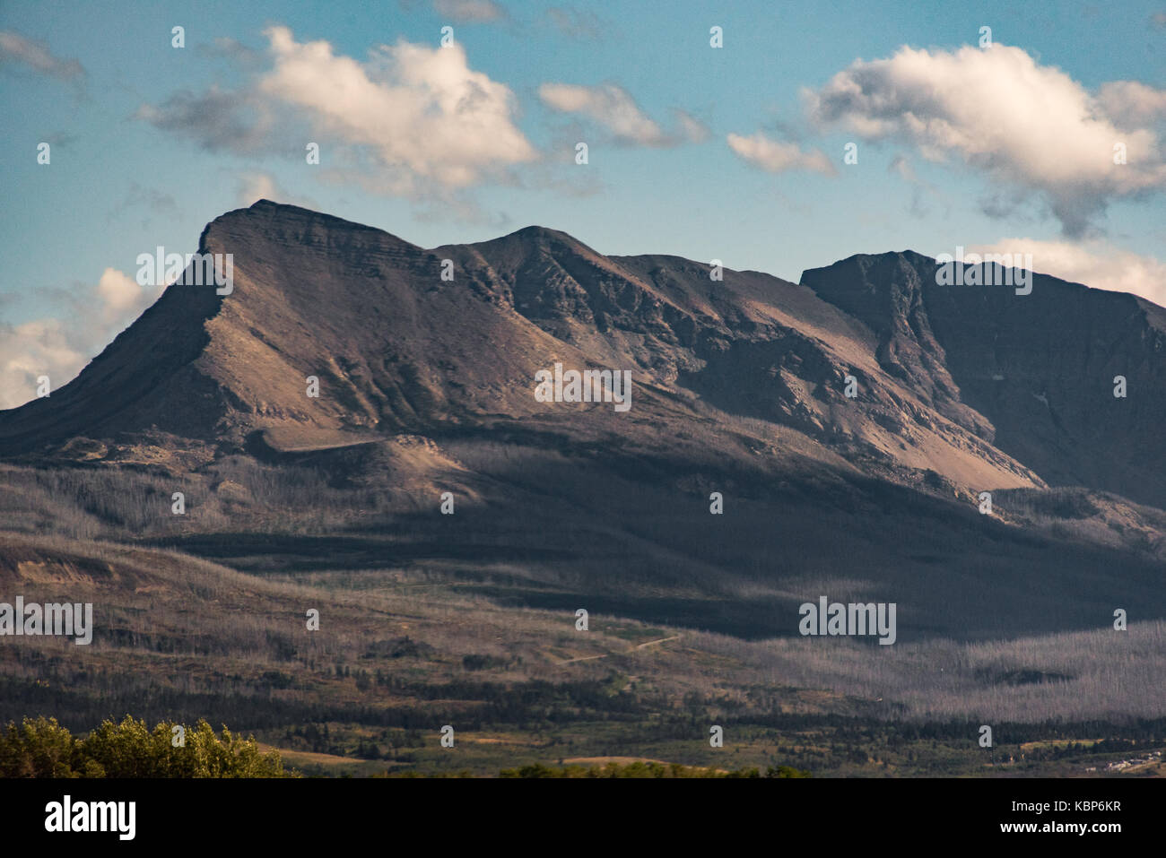 Distant Mountain Range Across Large Plain Stock Photo - Alamy