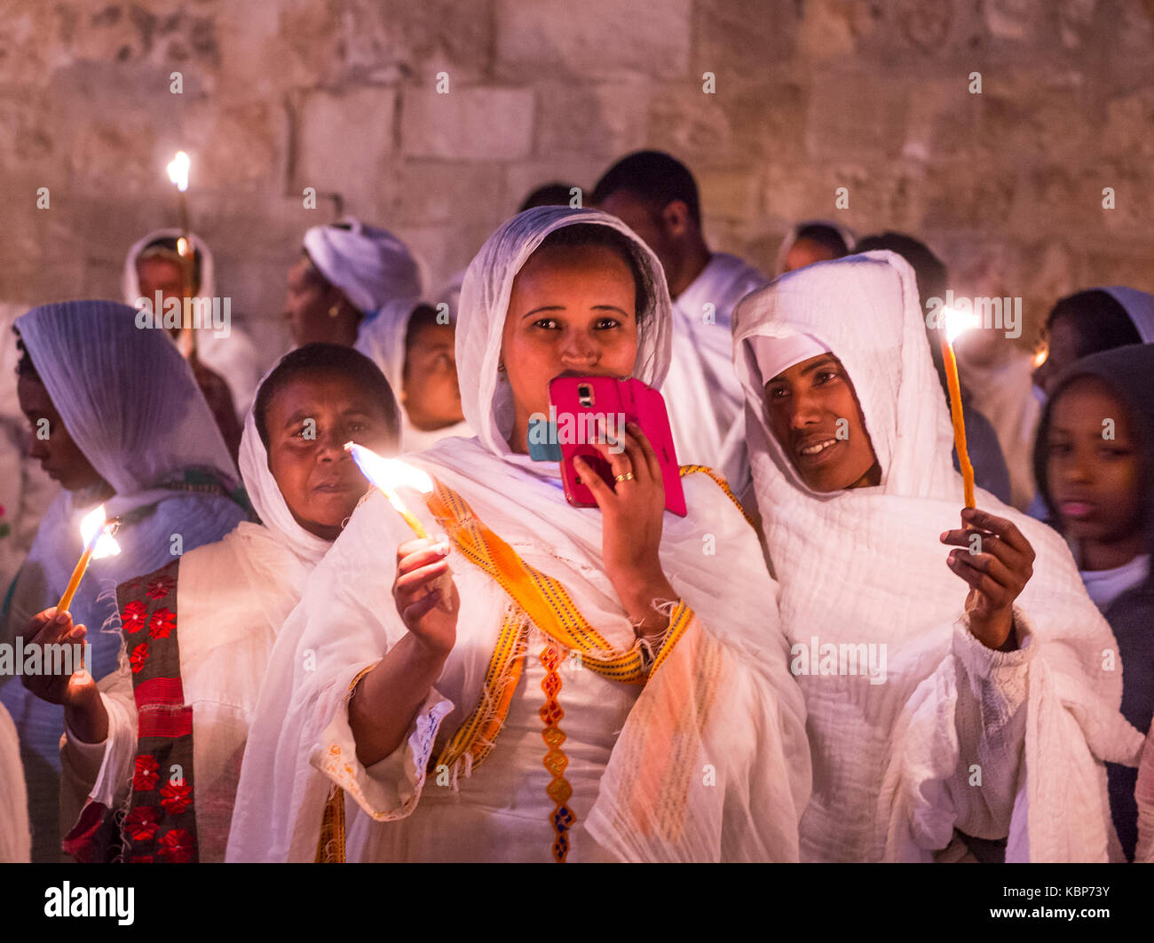 Ethiopian Orthodox pilgrims participates in the Holy fire ceremony at ...