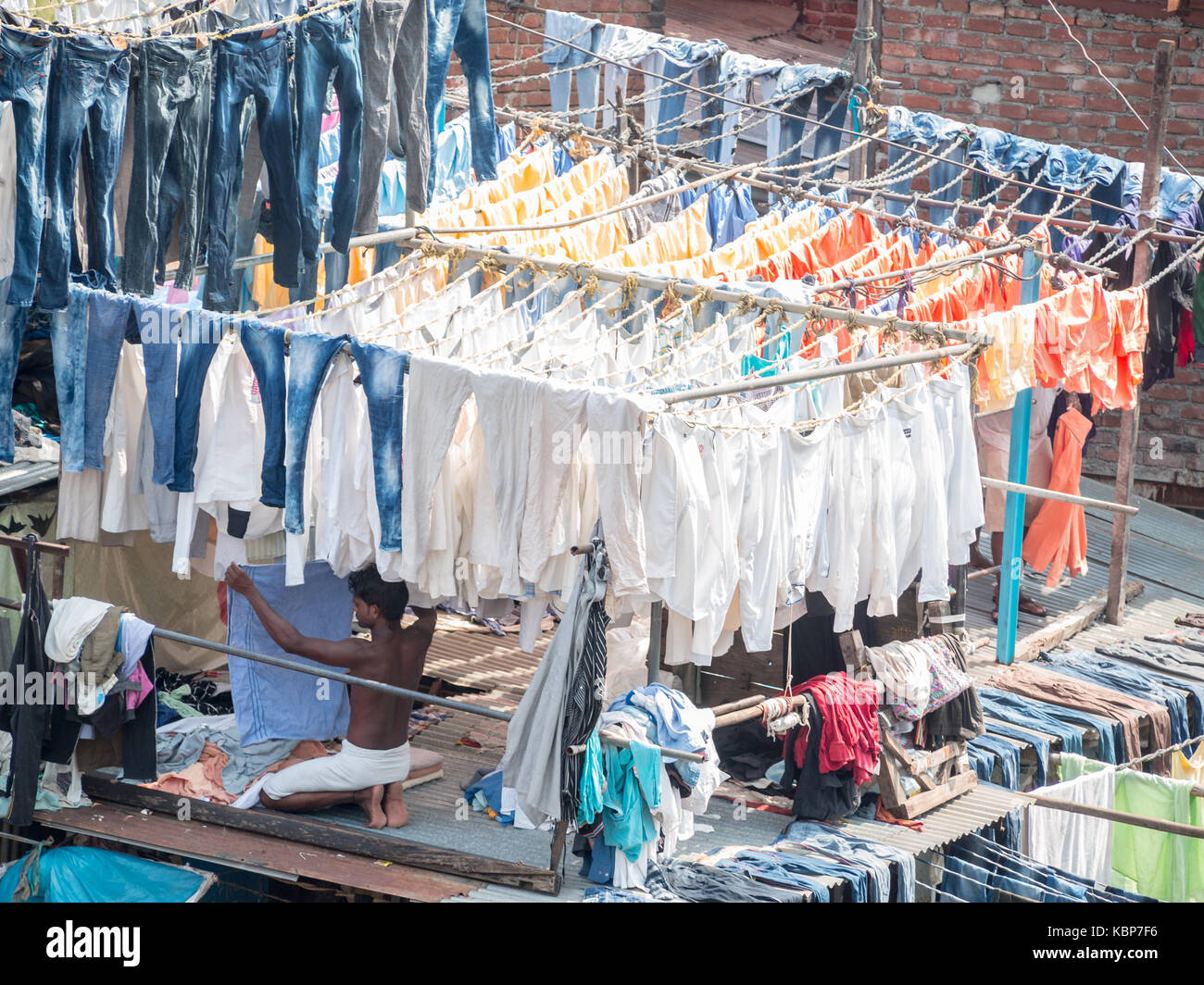 Mumbai Dhobi Ghat colourful hanging cloths Stock Photo - Alamy