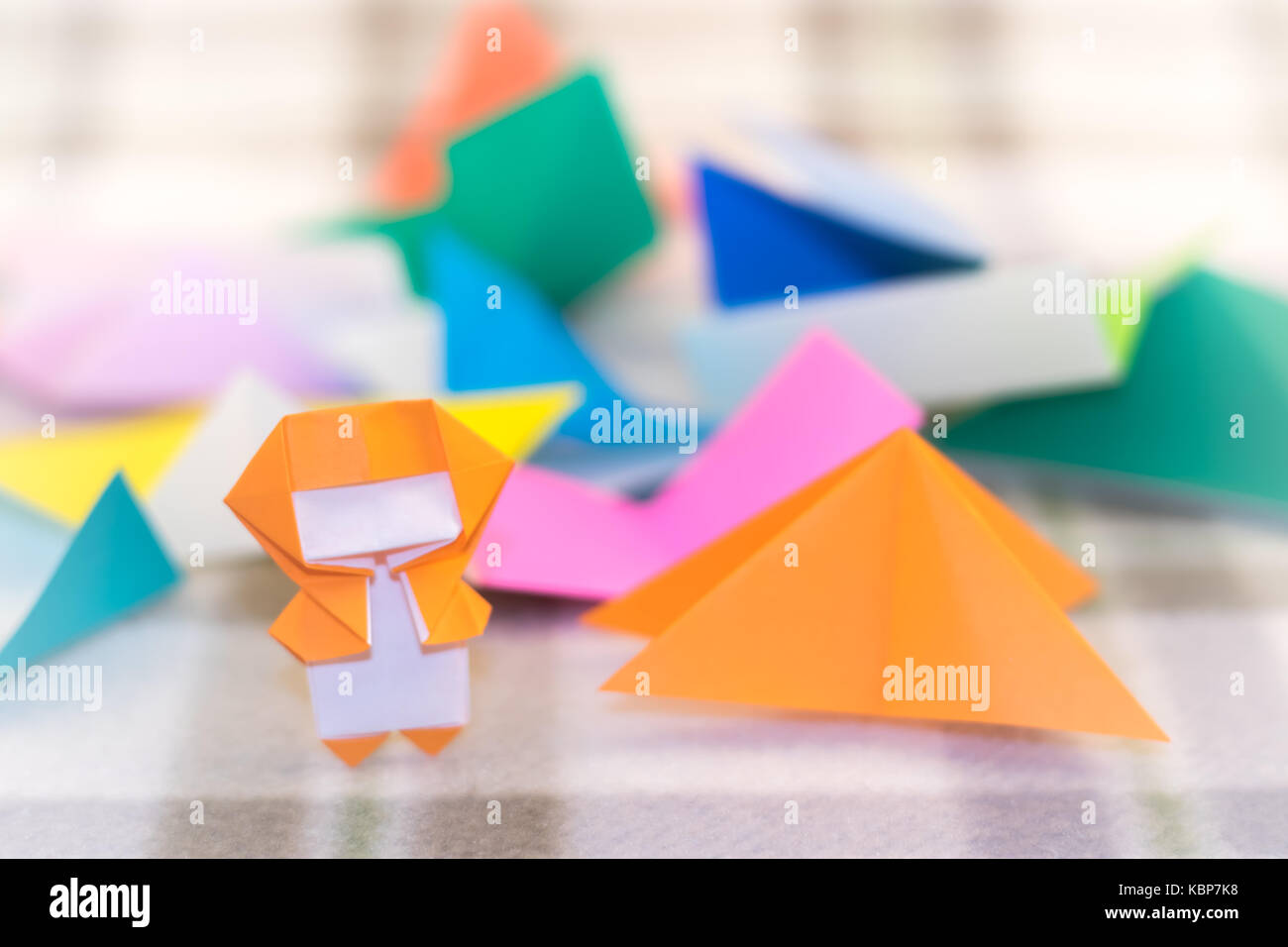 The Little Ninja Kid are Teaching How to Play Origami Stock Photo - Alamy