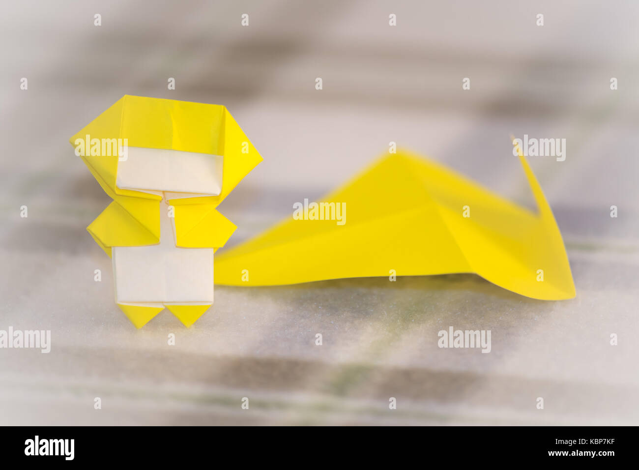 The Little Ninja Kid are Teaching How to Play Origami Stock Photo - Alamy