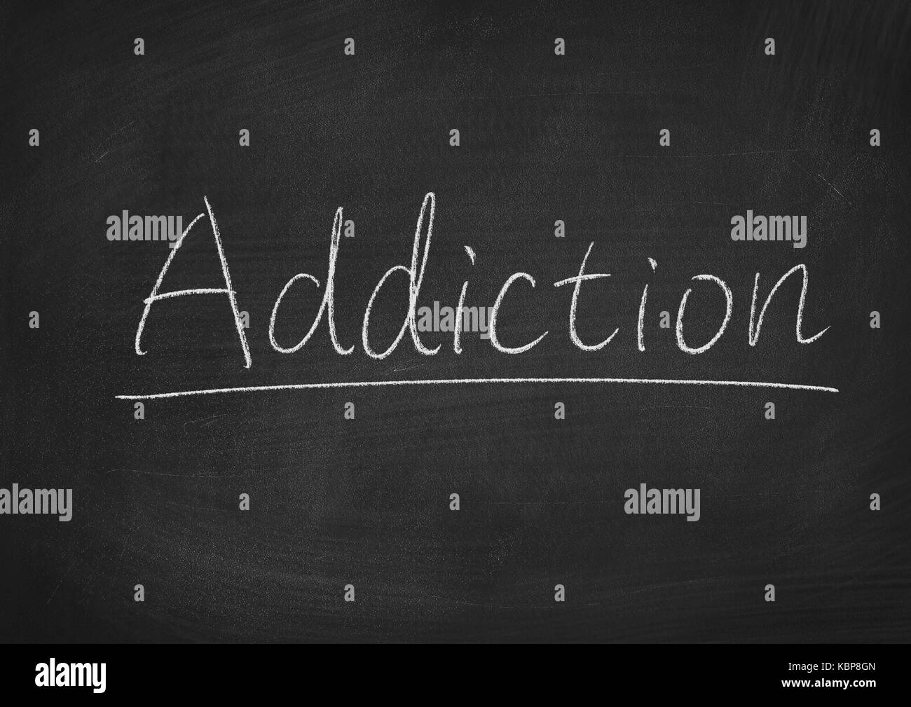 addiction concept word on a blackboard background Stock Photo - Alamy