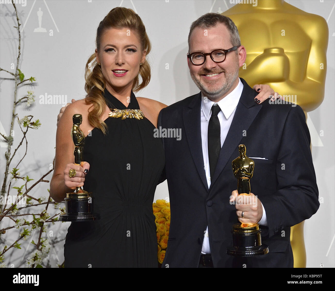 Caitlin Rogers and Morgan Neville poses in the press room during the ...