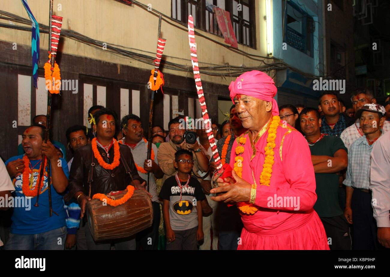 Kathmandu, Nepal. 30th Sep, 2017. Devotees dressed up as deity carrying ...