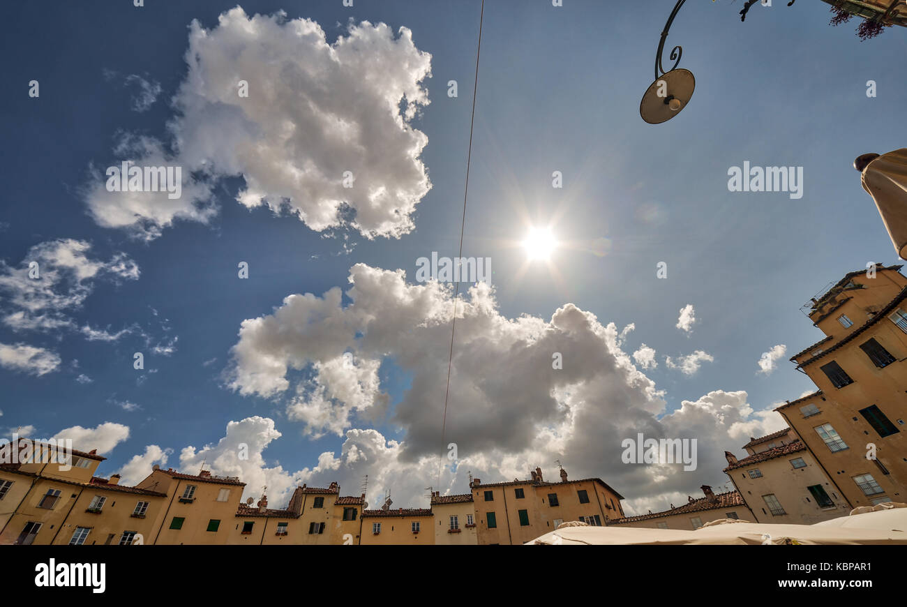 dizzy view of ancient buildings on the main square of Lucca, rare ...