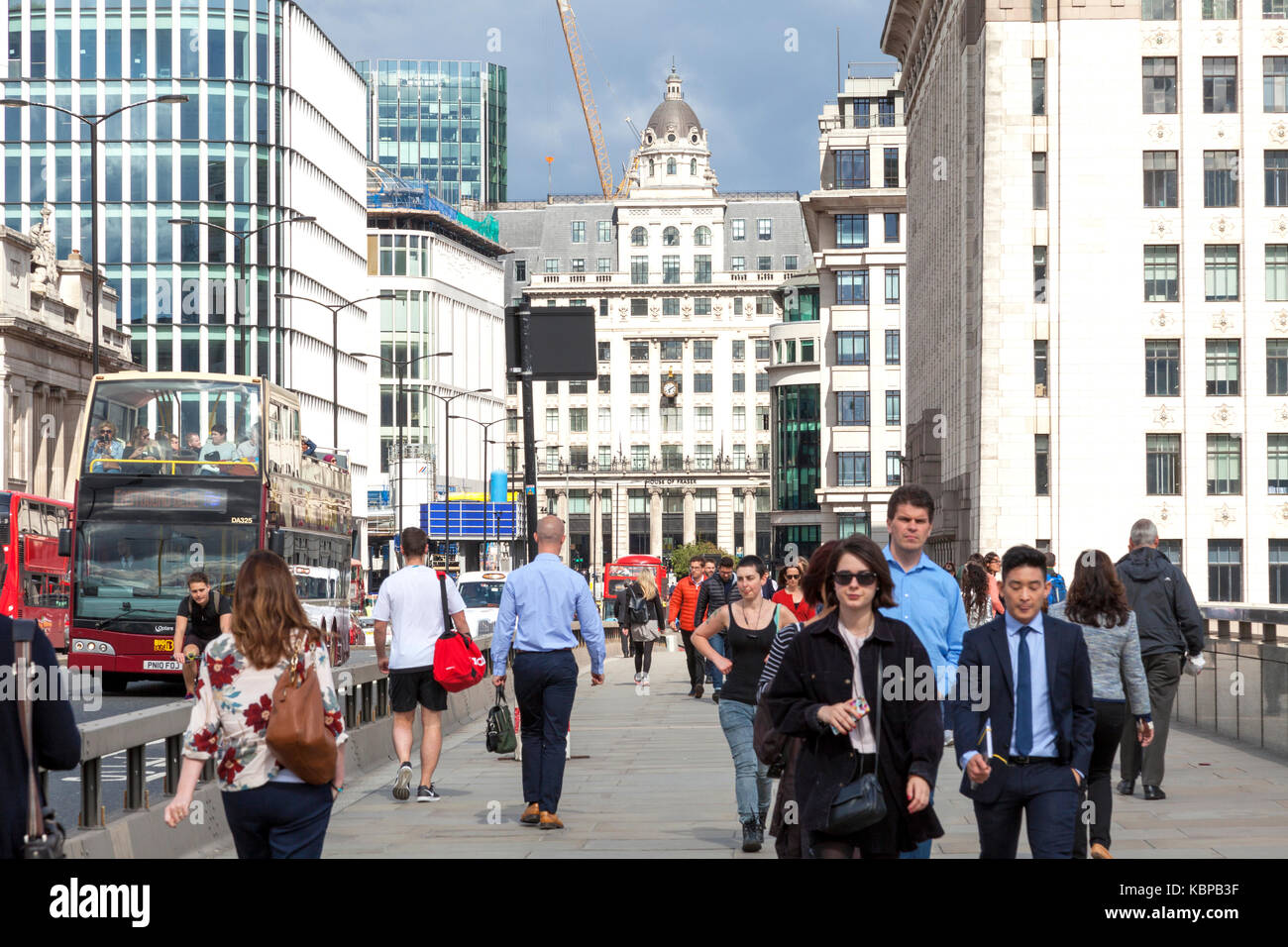 Pedestrians on London Bridge, England, U.K Stock Photo - Alamy