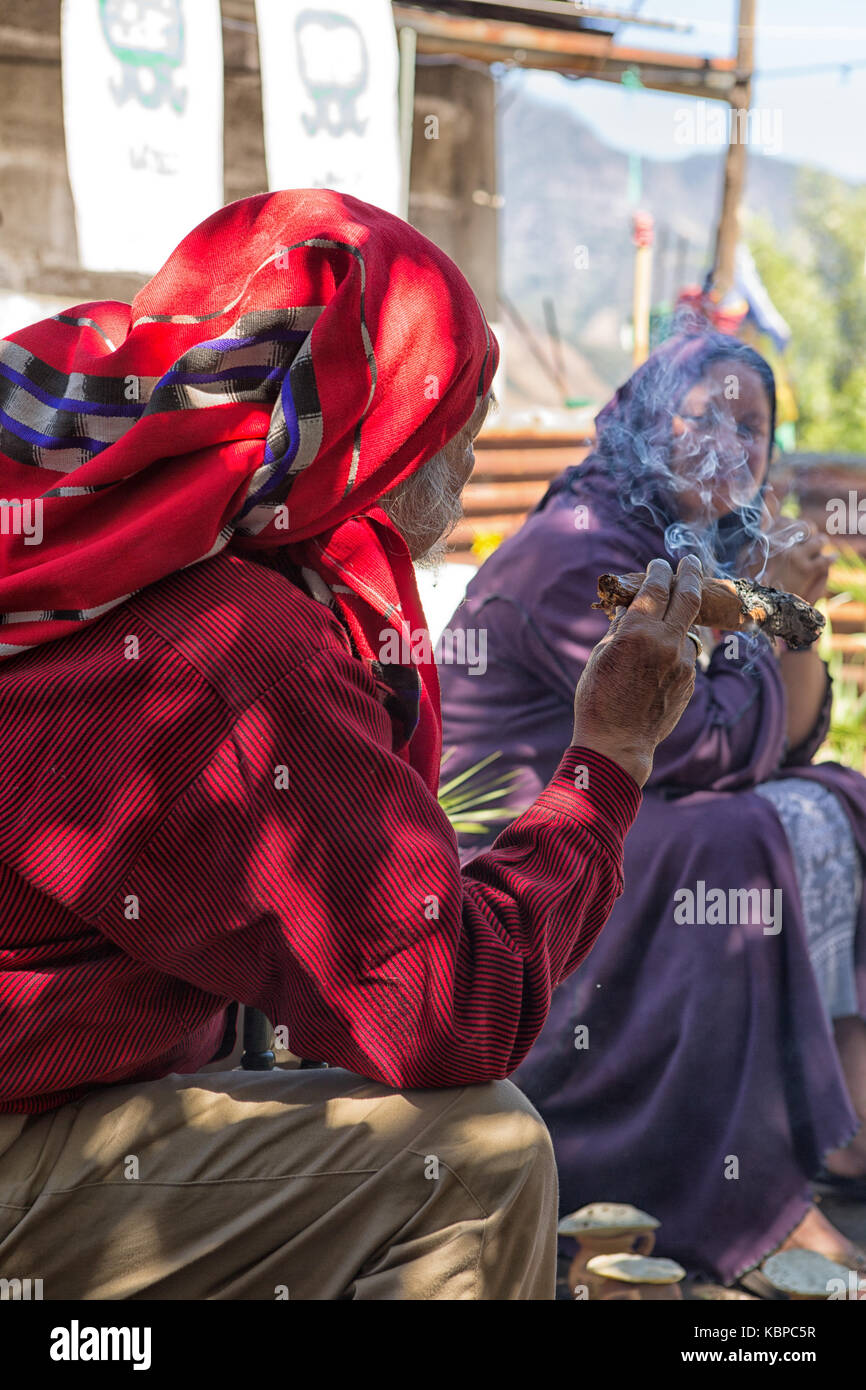 January 31, 2015 San Pedro la Laguna, Guatemala: Mayan shaman smoking a ...