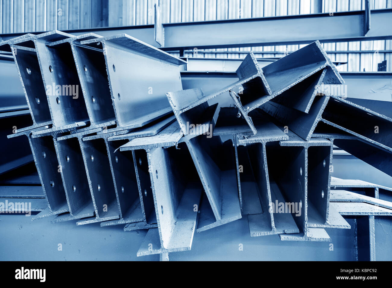Steel factory floor, stacked with a lot of steel Stock Photo - Alamy