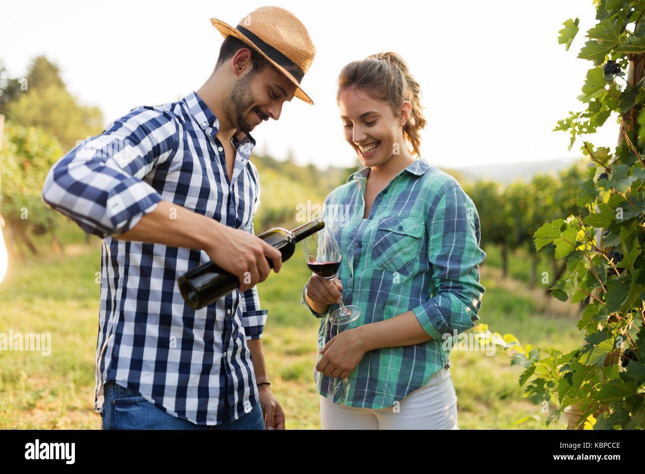 People tasting wine in vineyard Stock Photo - Alamy