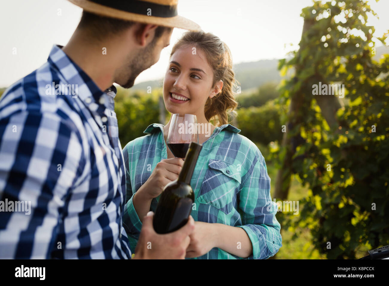 People tasting wine in vineyard Stock Photo - Alamy