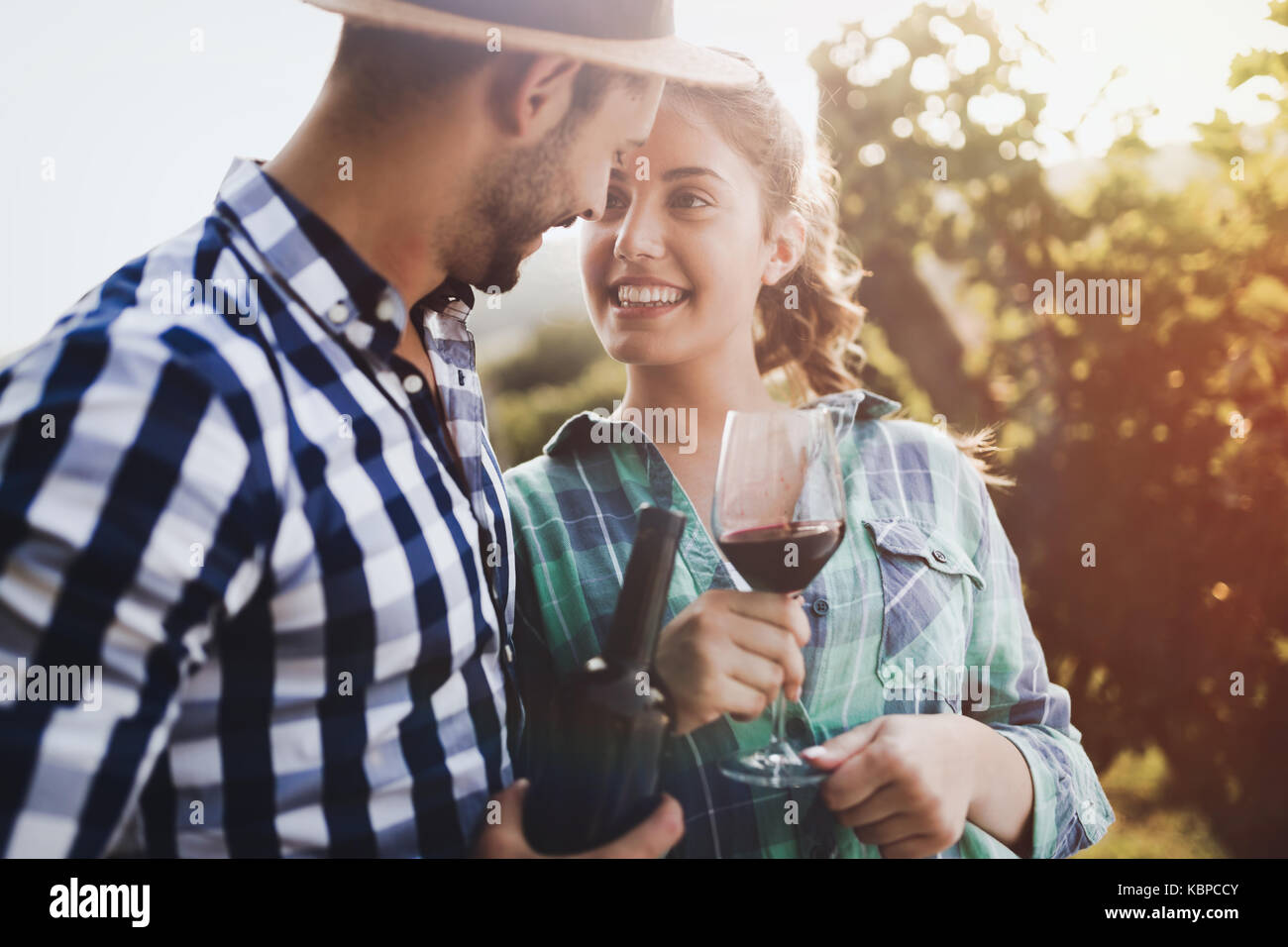 People tasting wine in vineyard Stock Photo - Alamy