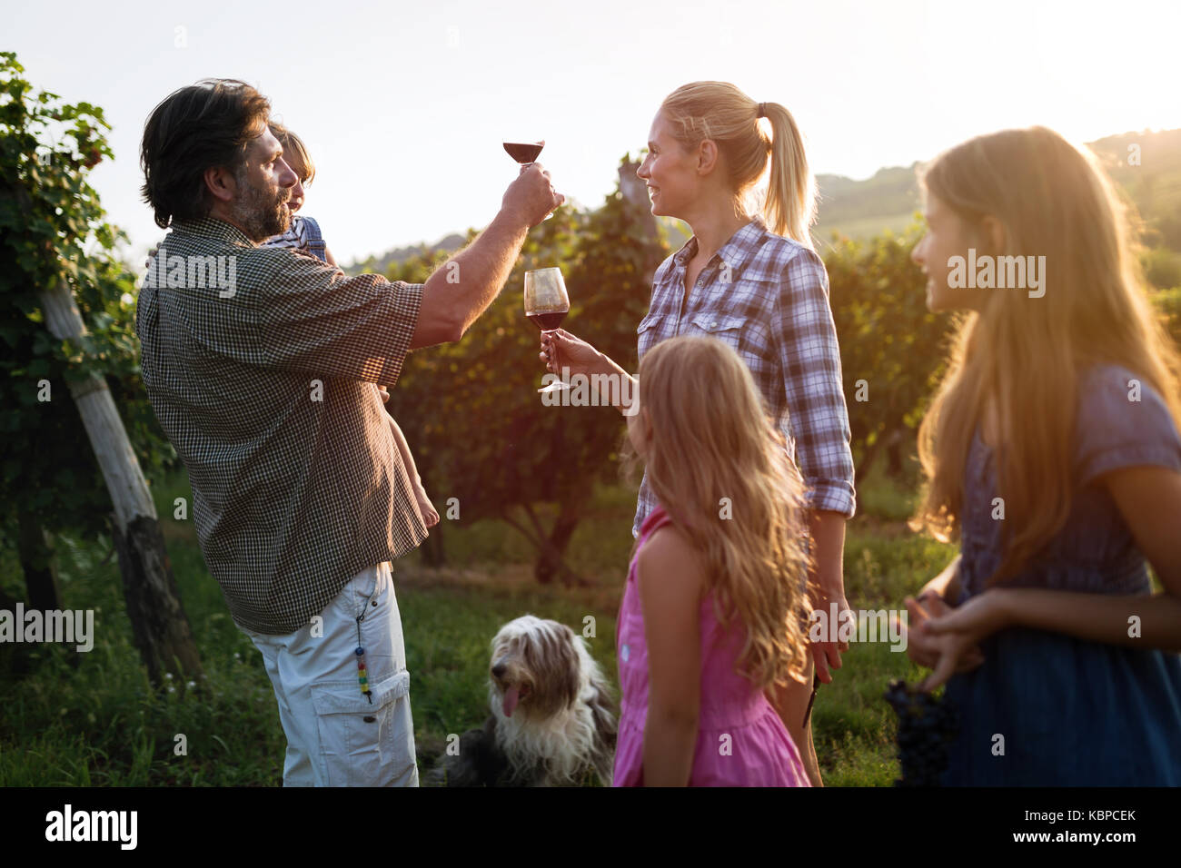 Winemaker family together in vineyard Stock Photo - Alamy Winemaker family together in vineyard Stock Photo - Alamy