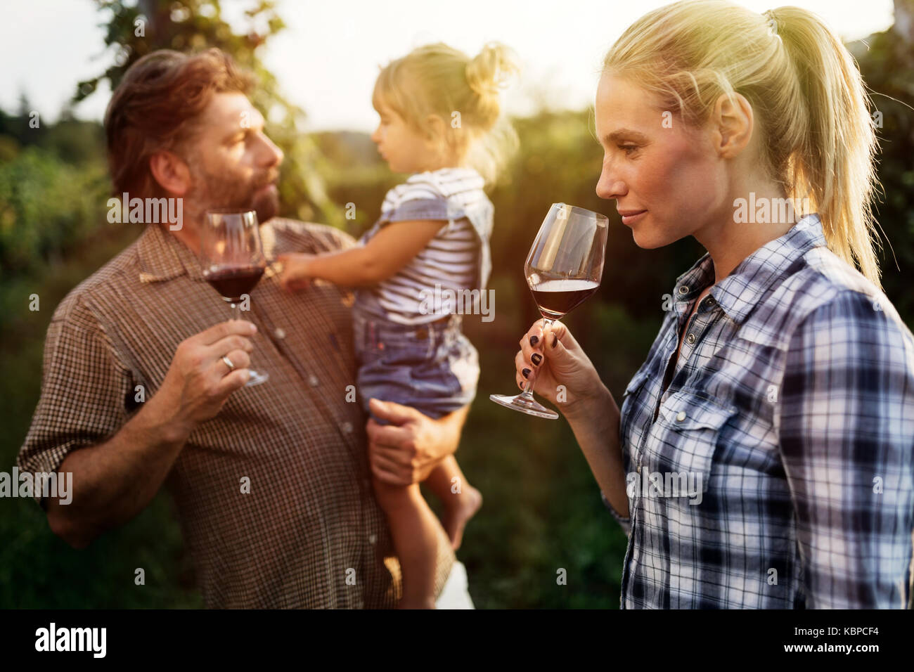 Winemaker family together in vineyard Stock Photo - Alamy Winemaker family together in vineyard Stock Photo - Alamy