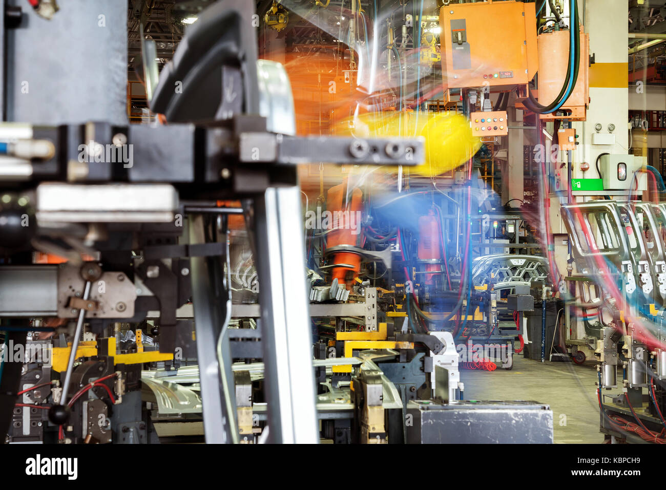 Car production line, skilled workers are working tense Stock Photo - Alamy