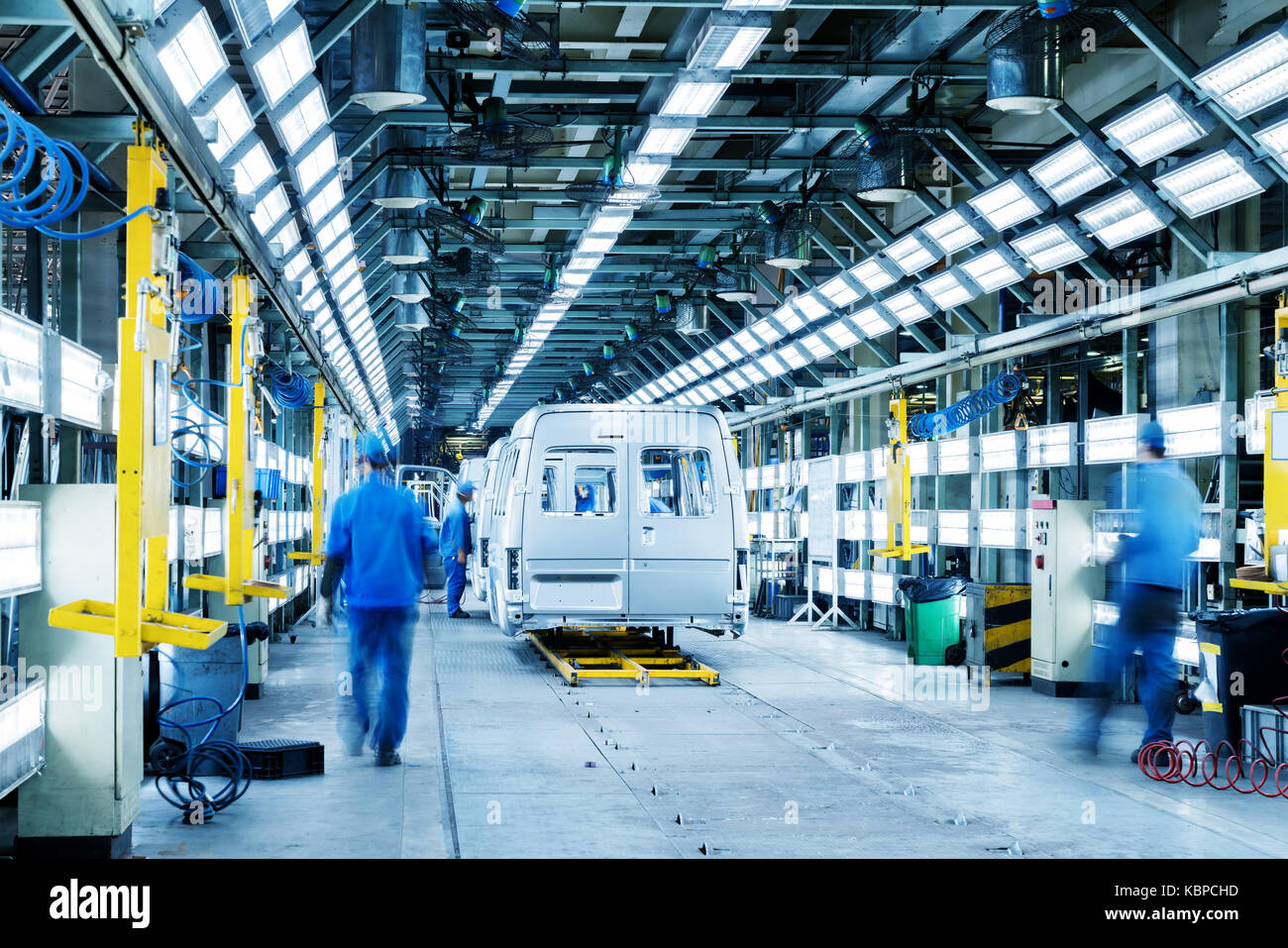 Car production line, skilled workers are working tense Stock Photo - Alamy