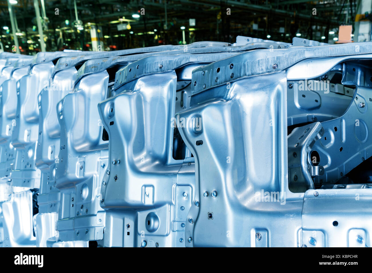 A car factory; neatly arranged exterior components of a car Stock Photo ...