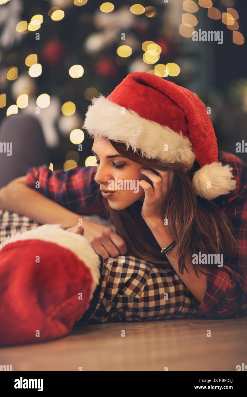 Young pair in love caress at Christmas eve Stock Photo - Alamy