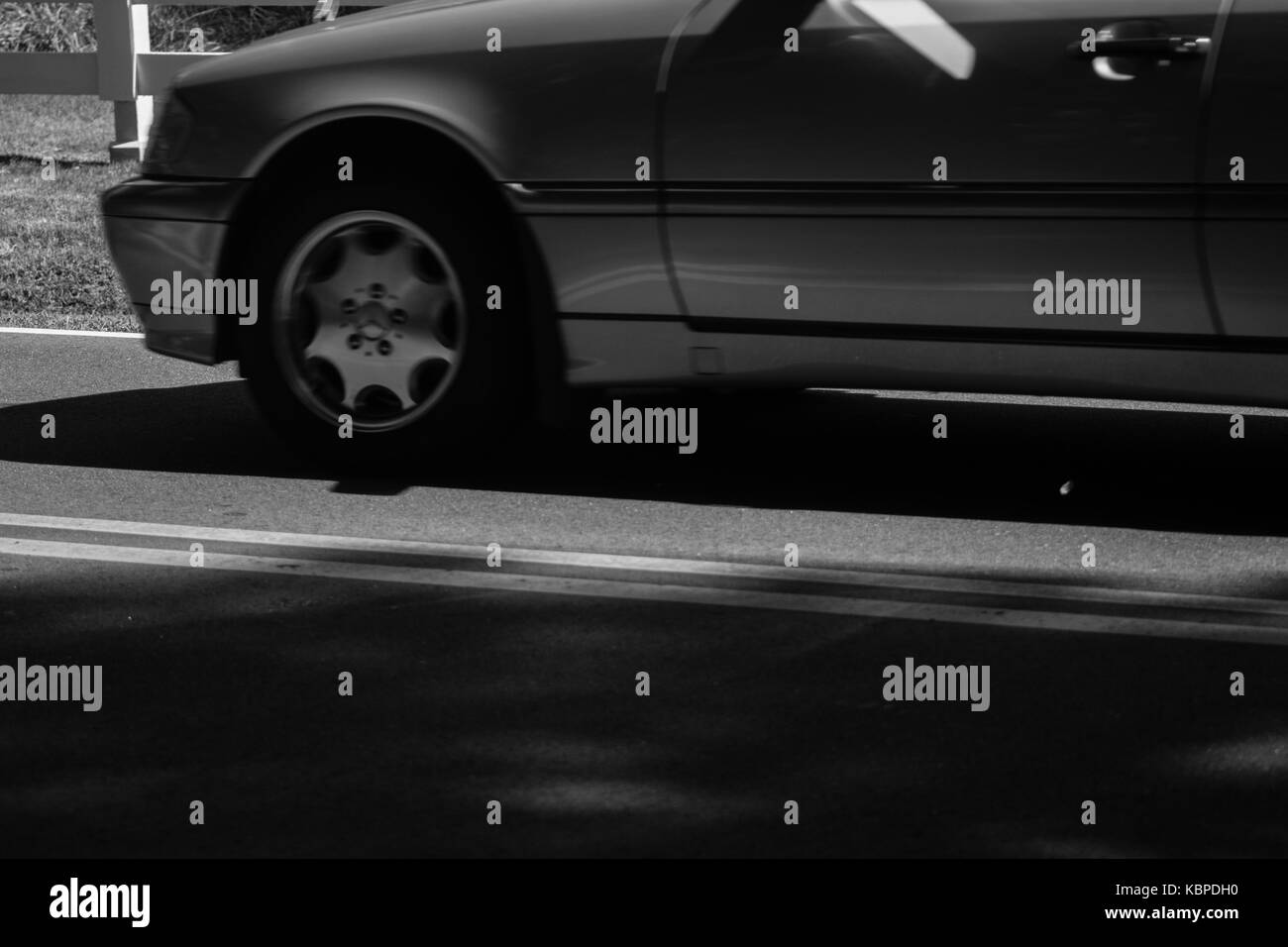 White sedan car driving Black and White Stock Photos & Images - Alamy