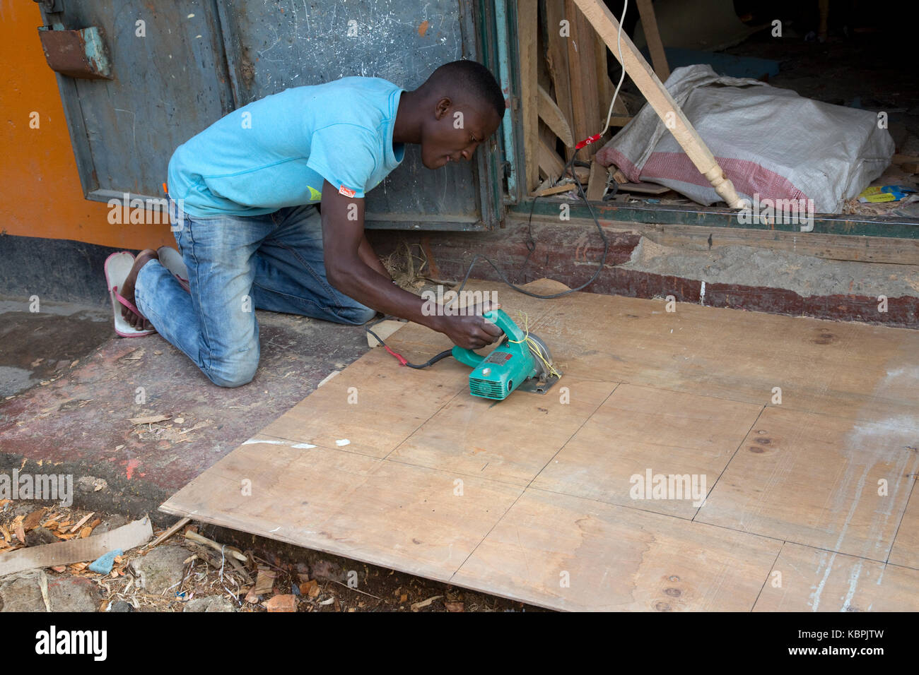 African cutting timber carpenter's shop Kamere Township Naivasha Kenya ...