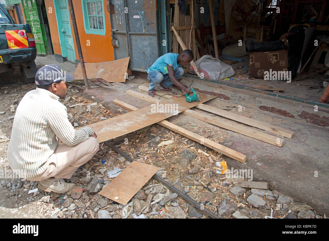 African cutting timber carpenter's shop Kamere Township Naivasha Kenya ...