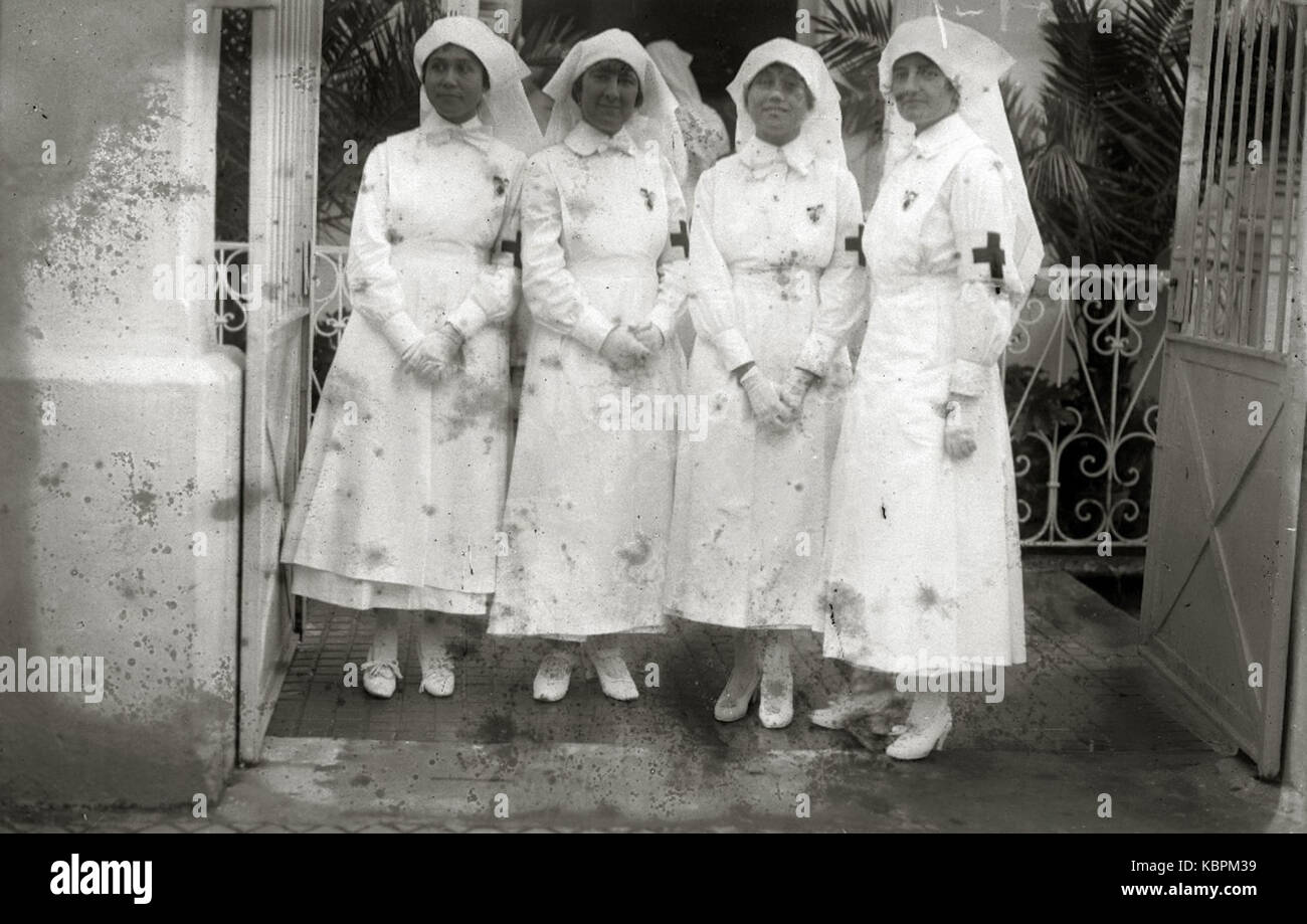 This historical photograph features a group of nurses from the Red ...