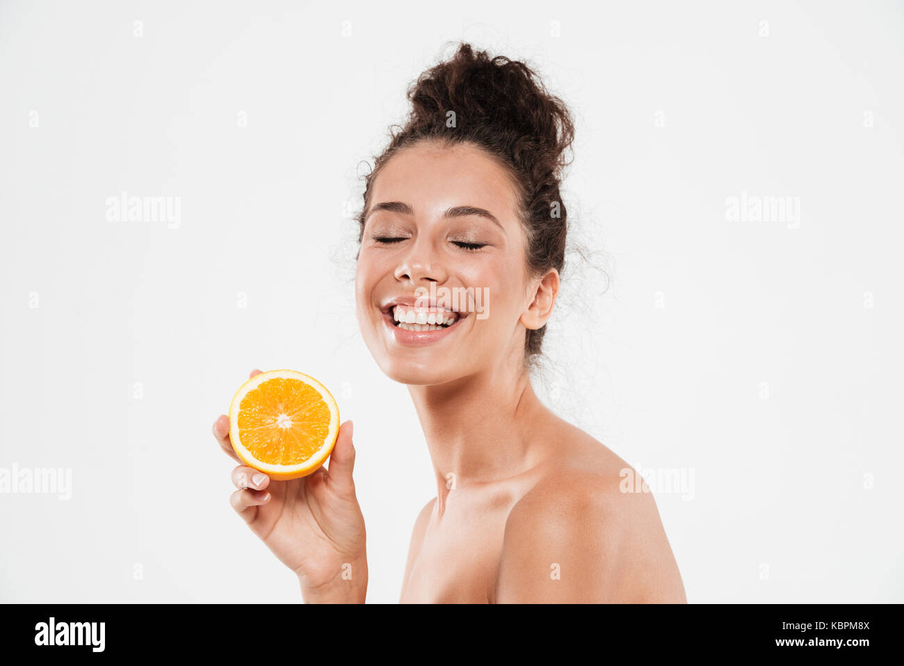 Close up portrait of a smiling happy woman with soft healthy skin ...