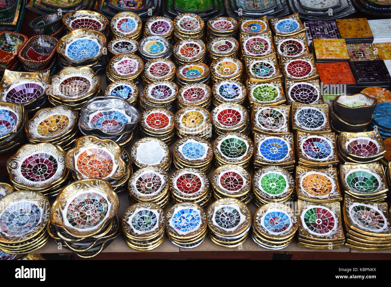 Colorful small plates sold in a shop in Ubud market in Bali, Indonesia ...